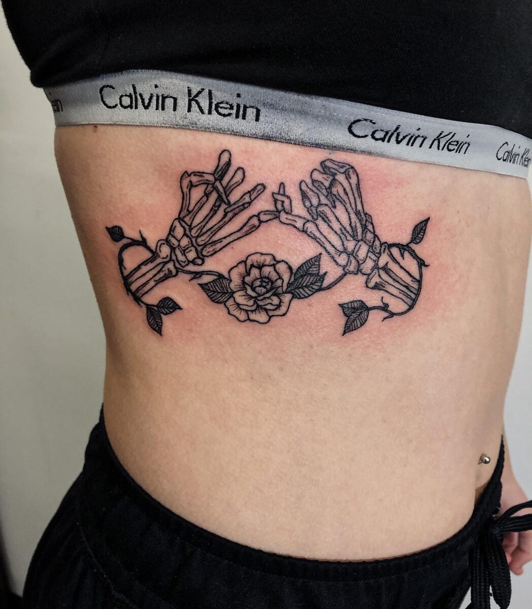 70+ Unique Rib Tattoos for Women with Deep Meanings