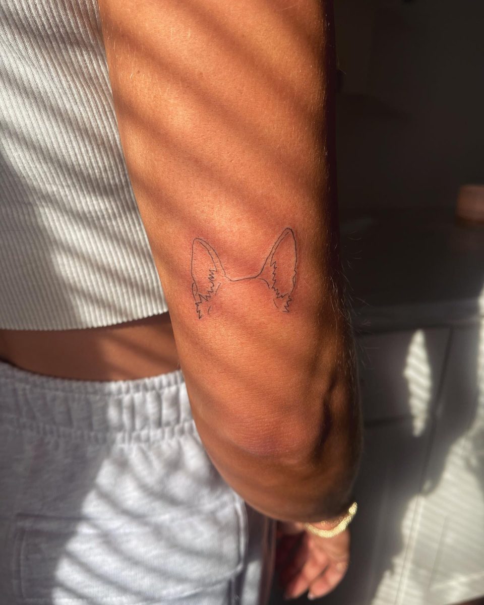 27 dog ear tattoo